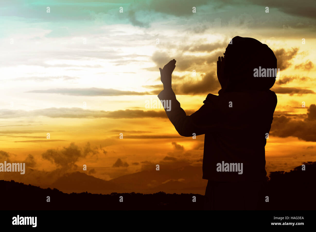 Back view of muslim woman praying wearing hijab Stock Photo - Alamy