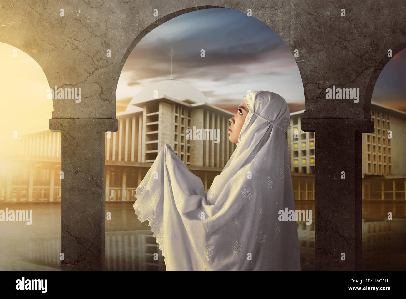Asian muslim woman wearing veil on mosque and pray to god Stock Photo ...