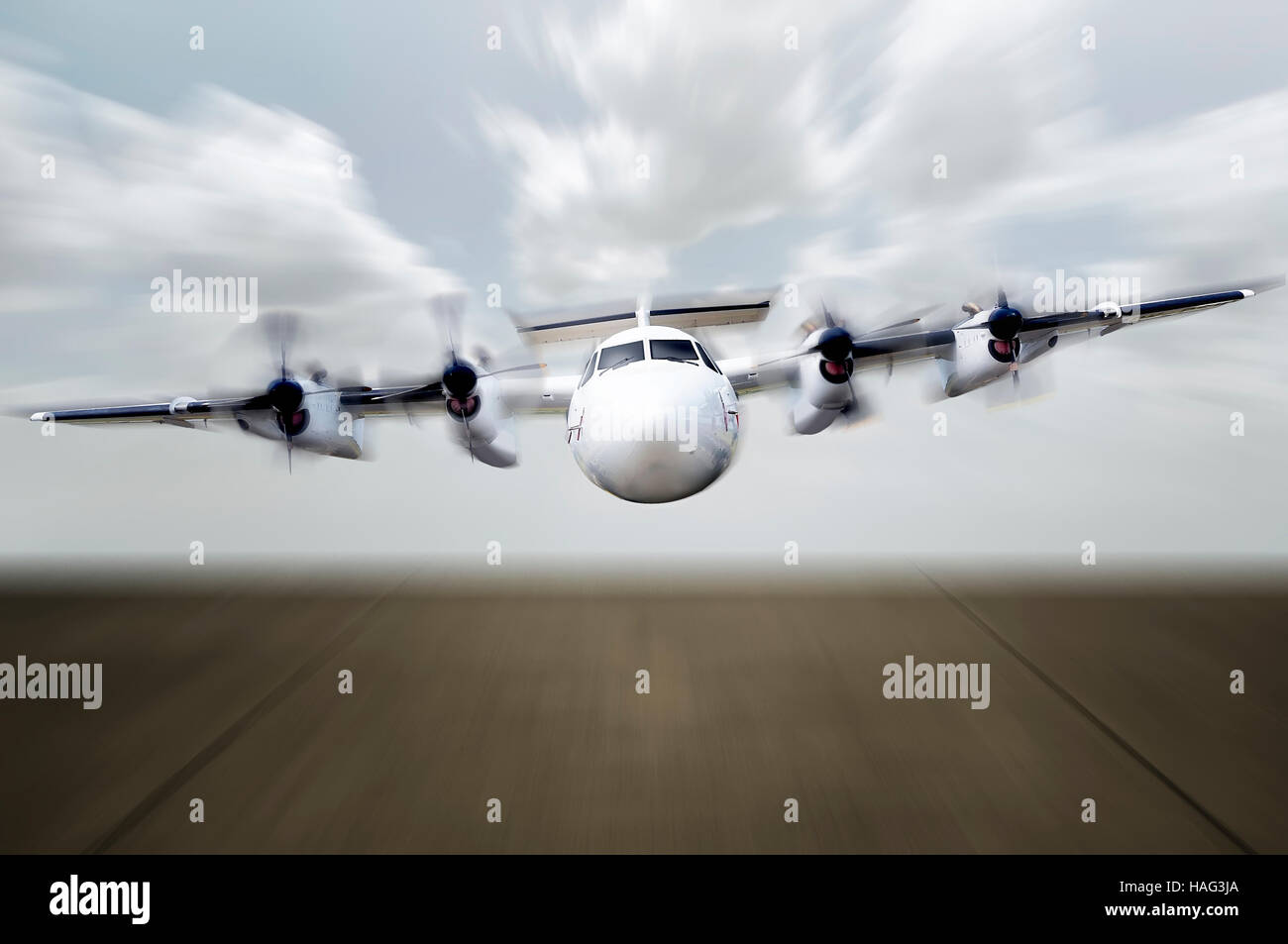Propeller plane flying on the sky. Ready for landing Stock Photo - Alamy