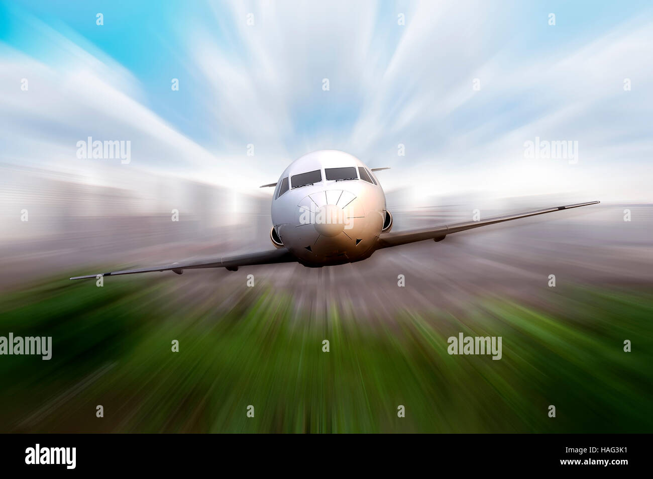 Private jet fly with motion blur effect background Stock Photo - Alamy