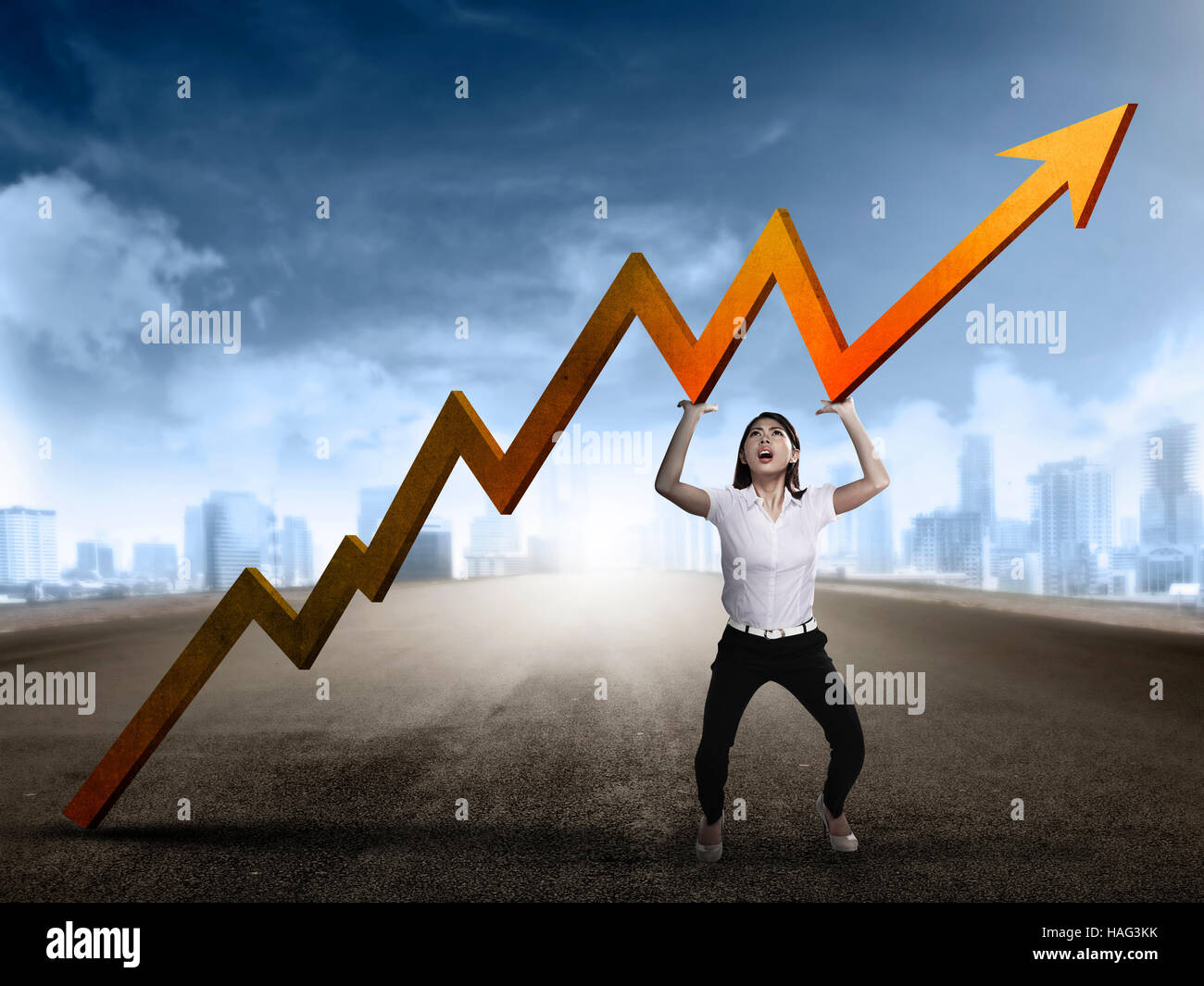 Asian business woman raise up sales chart so its ascending Stock Photo ...