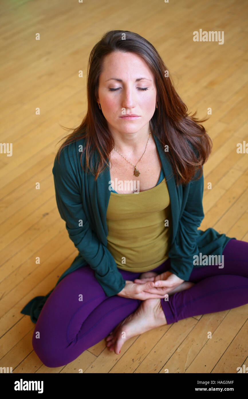 Female Yoga instructor in her studio Model release Available Stock ...