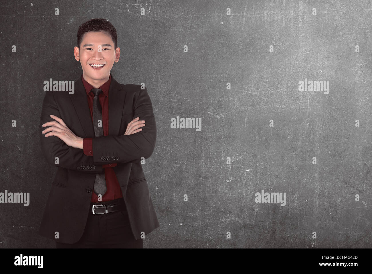 Image of successful asian business person over grey background Stock ...