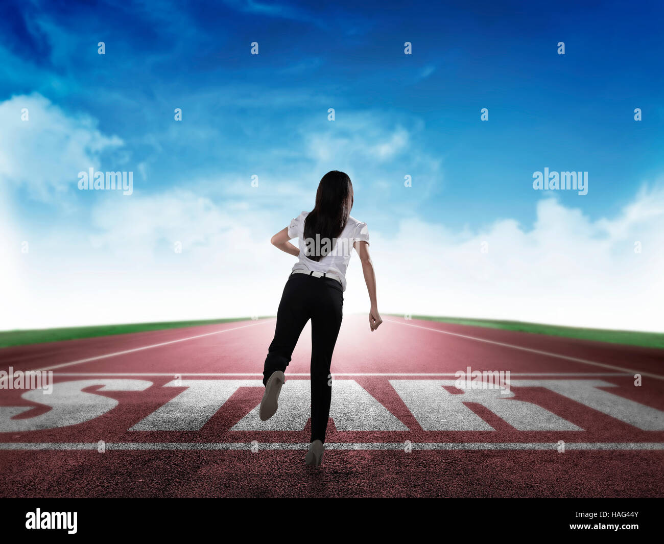 Back view of business woman running from start line. Business career ...
