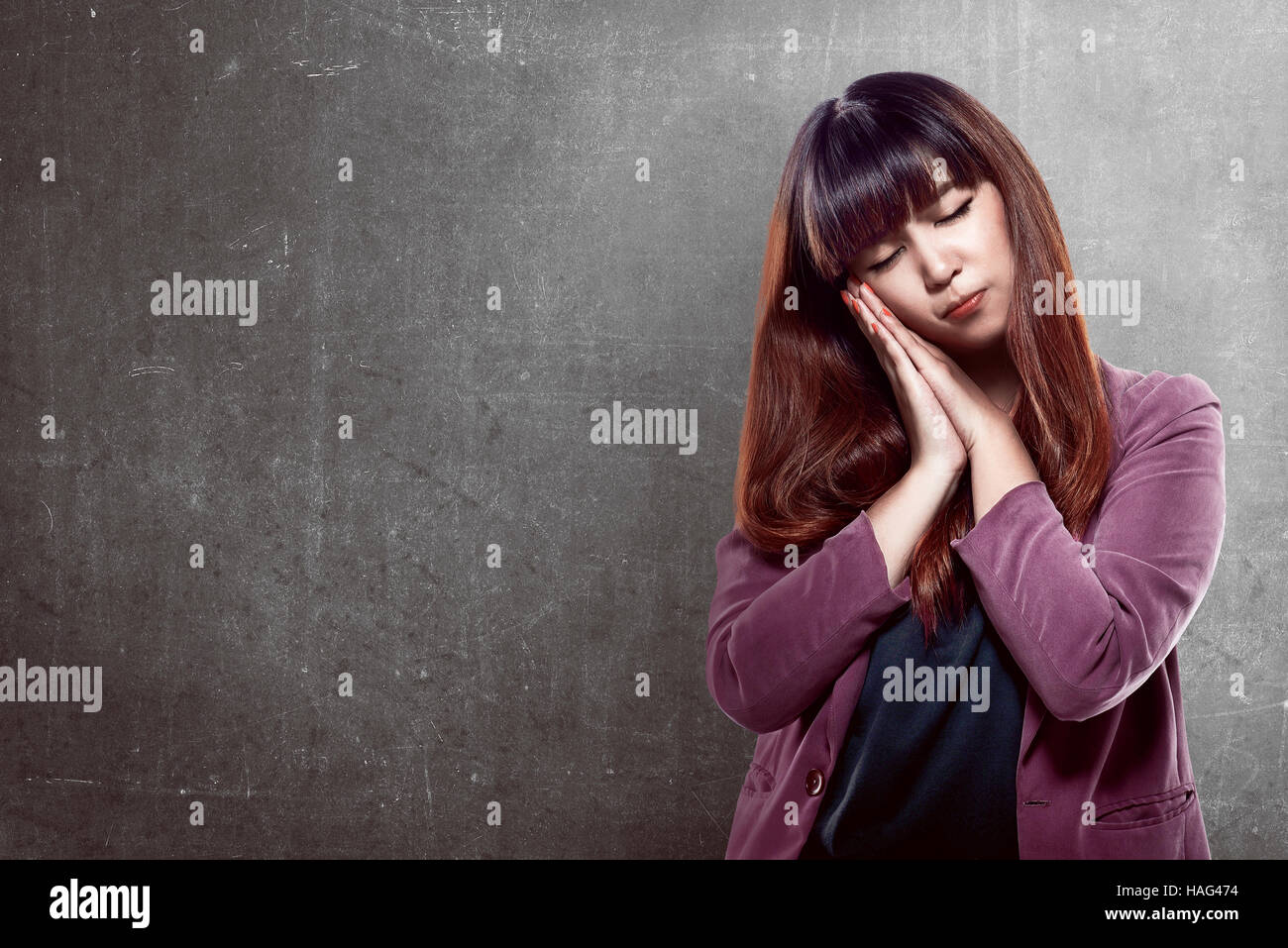 Asian woman with sleepy gesture close her eyes Stock Photo - Alamy