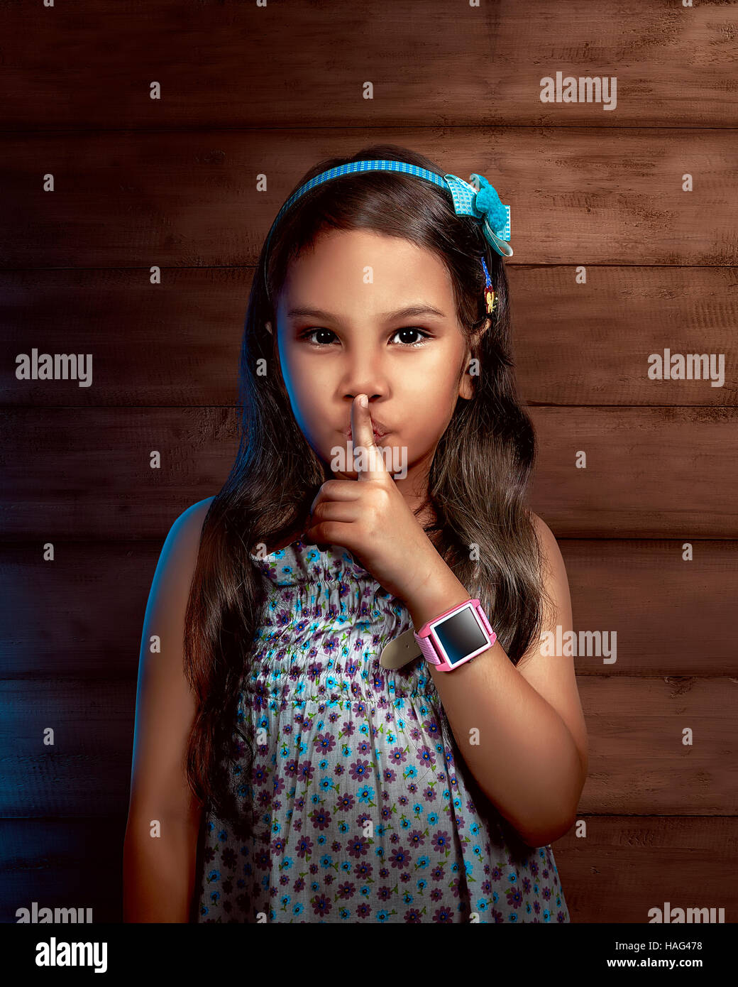 Little girl wearing smartwatch on her arm Stock Photo - Alamy