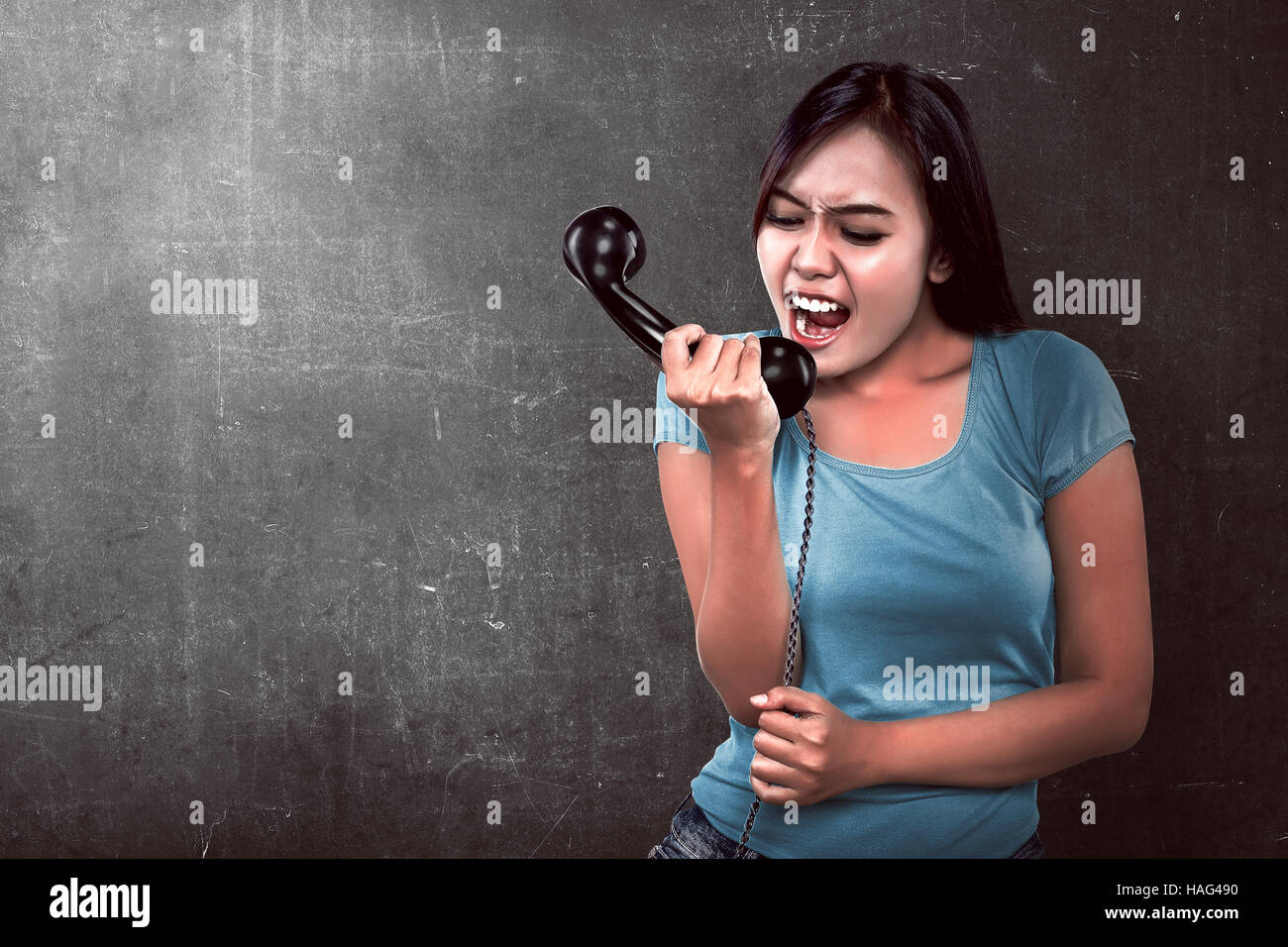 Angry asian woman shouting telephone hi-res stock photography and ...