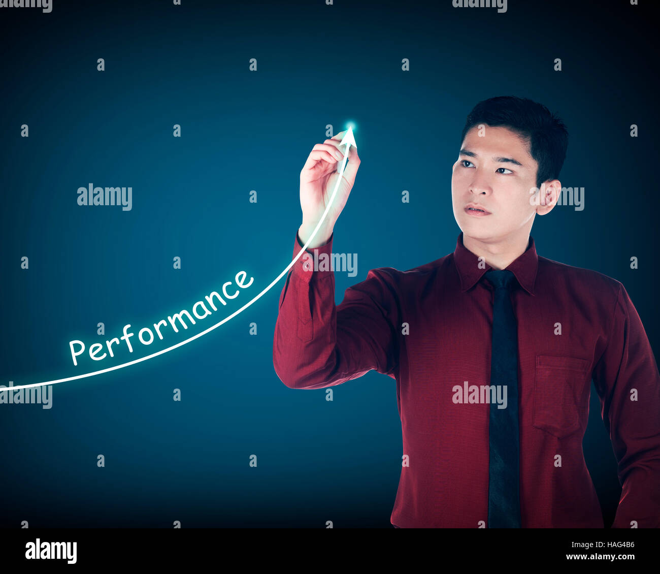 Asian business man writing performance and increasing line Stock Photo ...