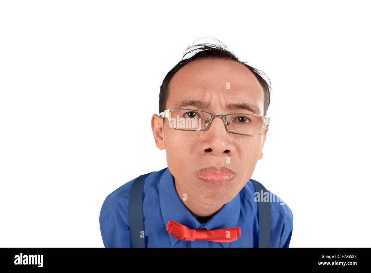 Nerdy and crazy man confused expresion, isolated over white background ...