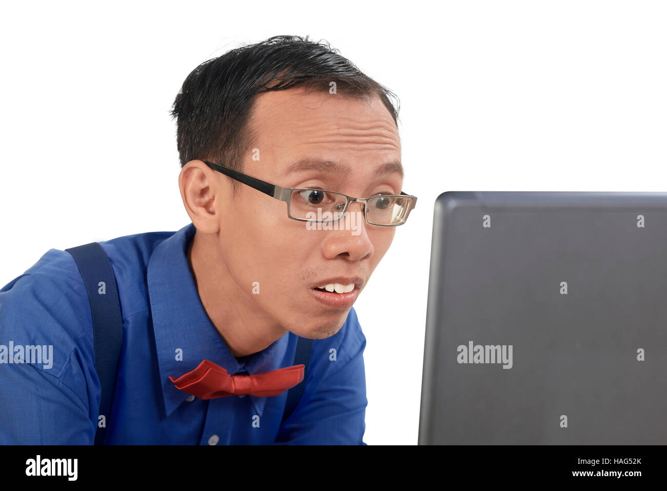 Nerd man using laptop look concentration, isolated over white ...