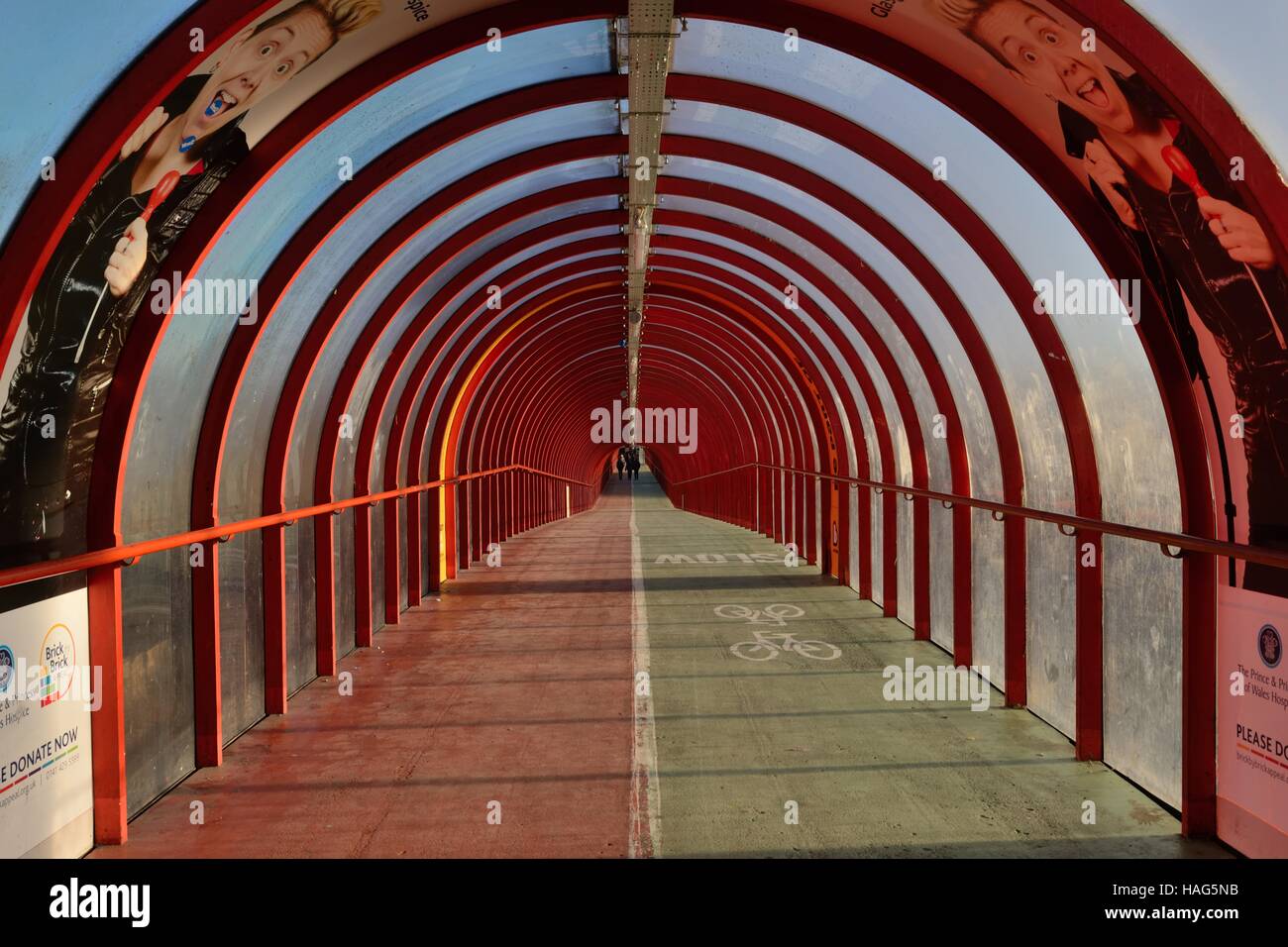 An enclosed walkway over the expressway in Glasgow, Scotland, UK Stock ...