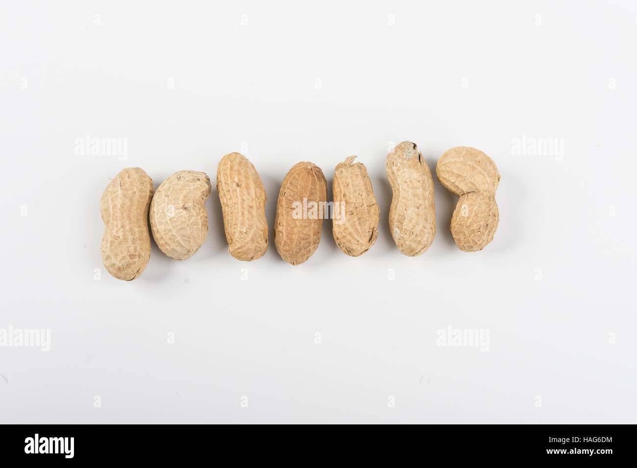 Peanuts with skins hi-res stock photography and images - Alamy