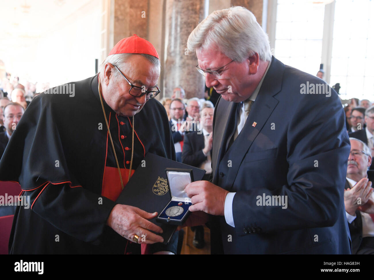 Premier of Hesse Volker Bouffier (CDU, r) hands Cardinal Karl Lehmann ...