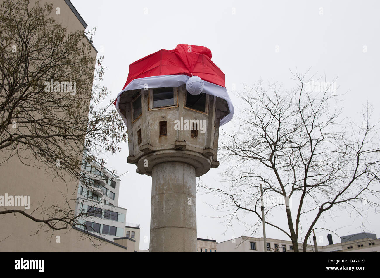 Berlin, Germany. 30th Nov, 2016. A red Christmas hat on top of a former ...