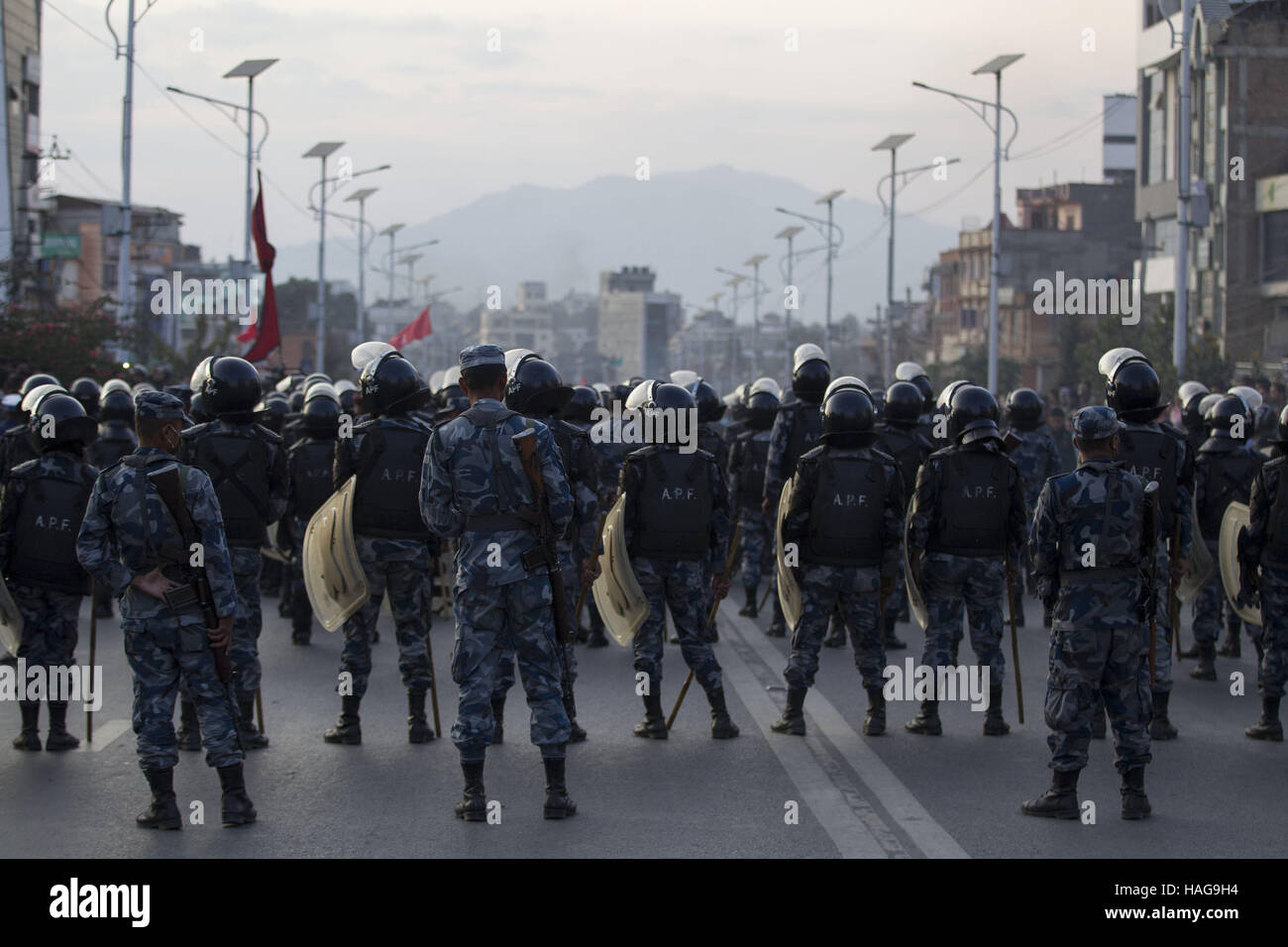 Kathmandu, Nepal. 30th Nov, 2016. Security personnel stand guard during ...