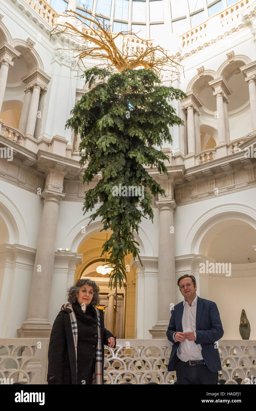 London, UK. 1st December 2016. A Christmas tree is unveiled by (L to R) artist Shirazeh ...