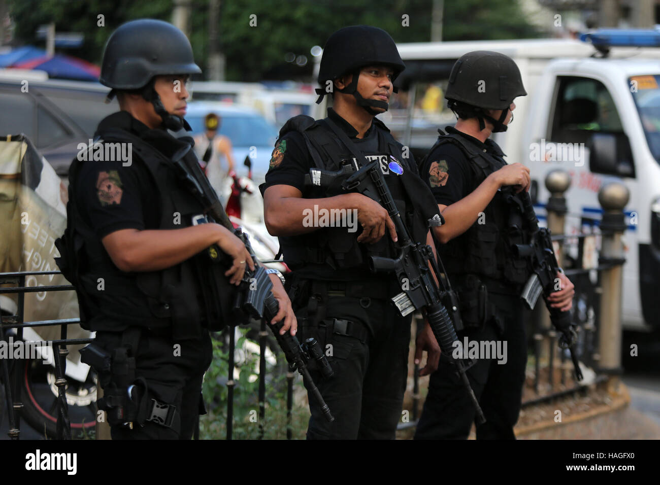 Quezon City, Philippines. 1st Dec, 2016. Policemen patrol a street in ...