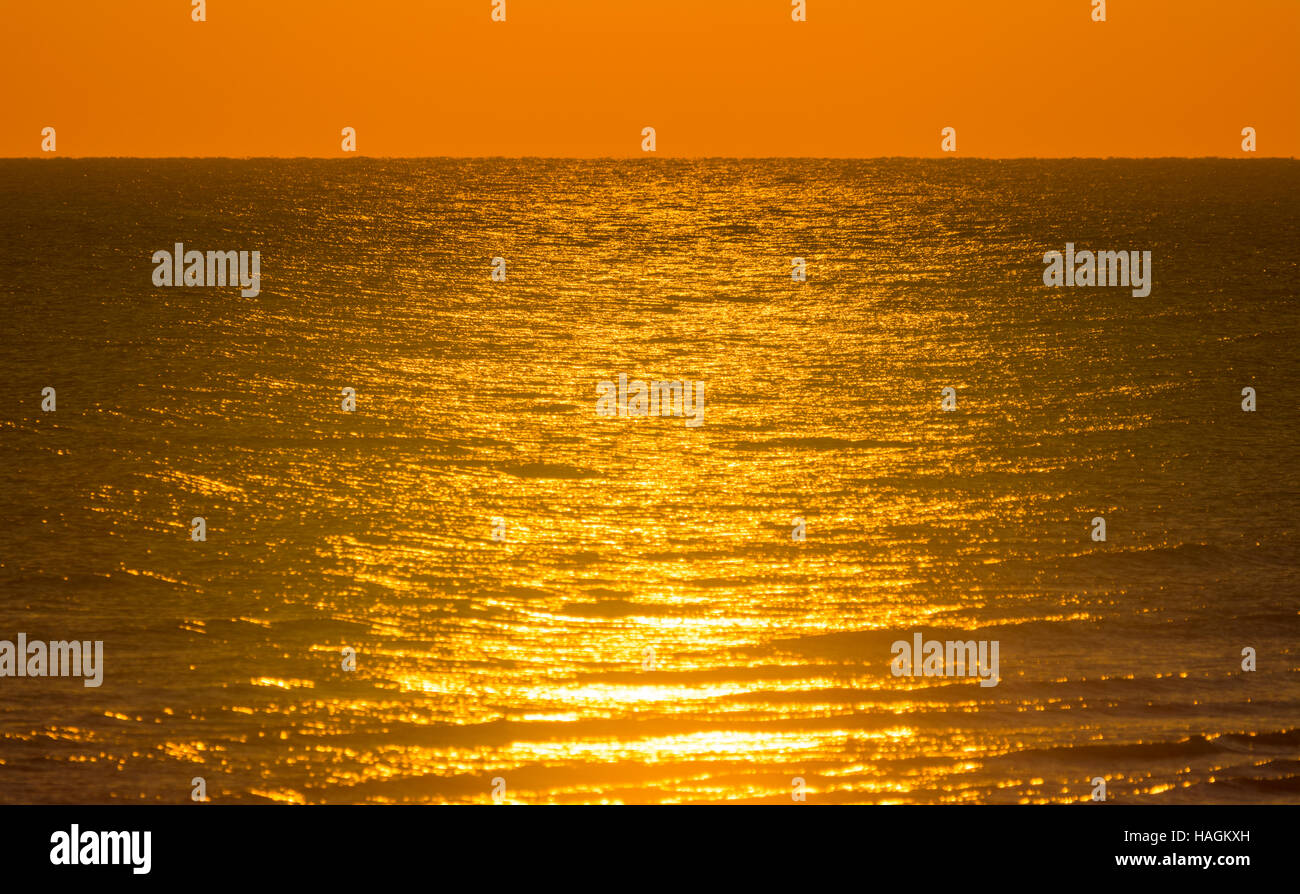 Reflection of sunlight on the sea. Sunset reflecting. Sun reflecting in ...