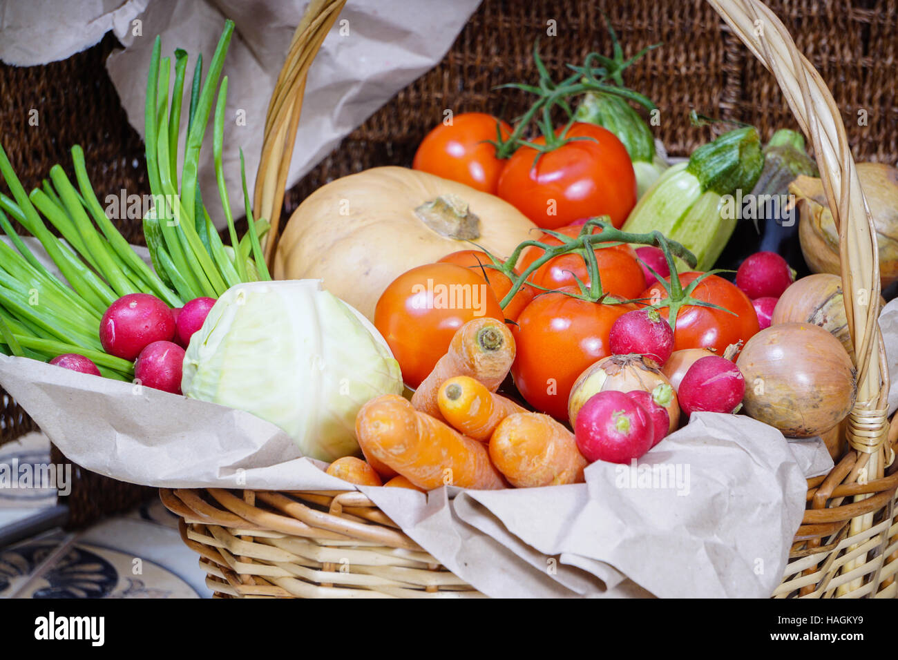 Different kinds of vegetables picked in the harvest basket Stock Photo ...