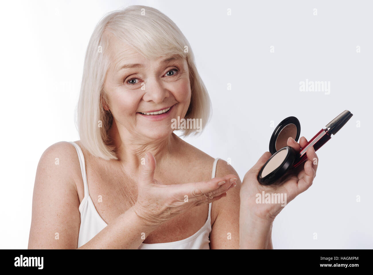 Woman brush powder mature hi-res stock photography and images - Alamy