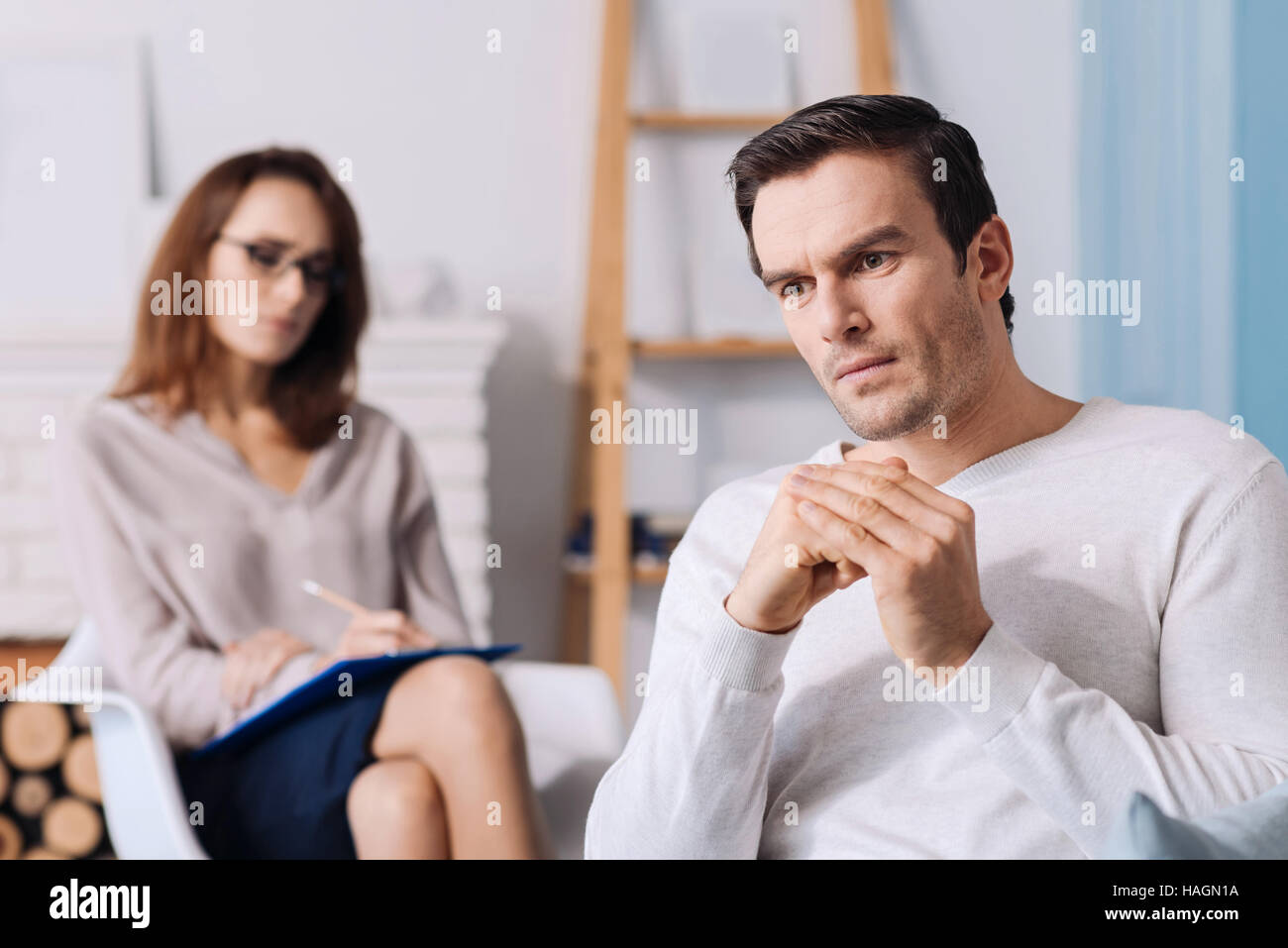 Troubled man talkign his problems Stock Photo - Alamy