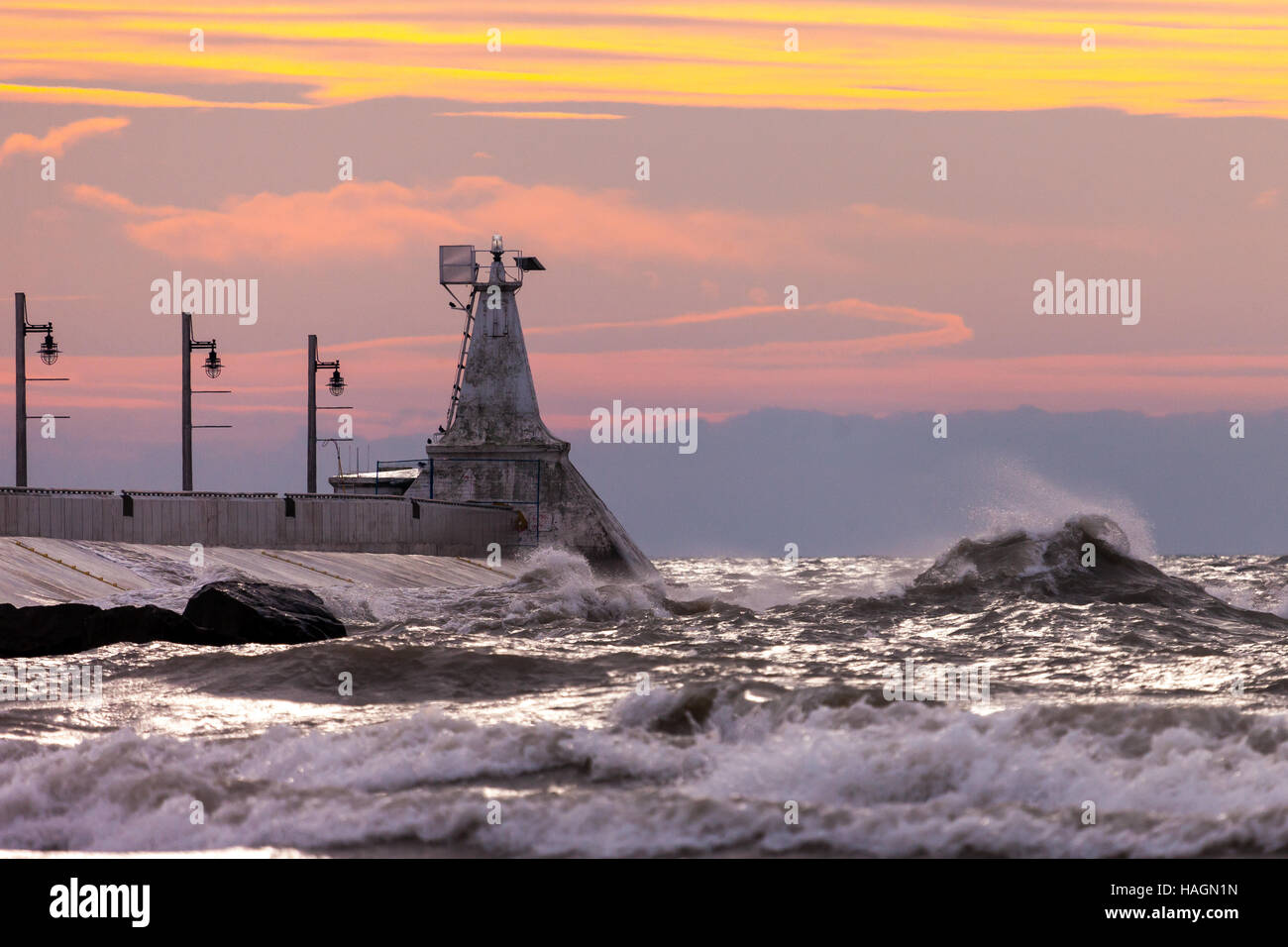 Sunrise and waves along the shoreline of Lake Erie at Port Stanley ...