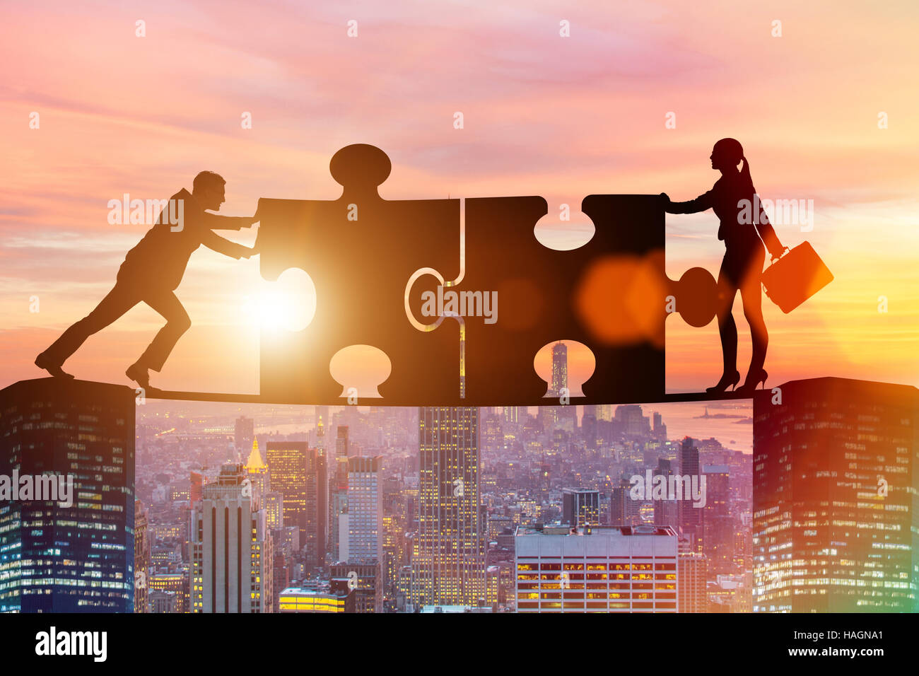 Business concept of teamwork with jigsaw puzzle Stock Photo - Alamy