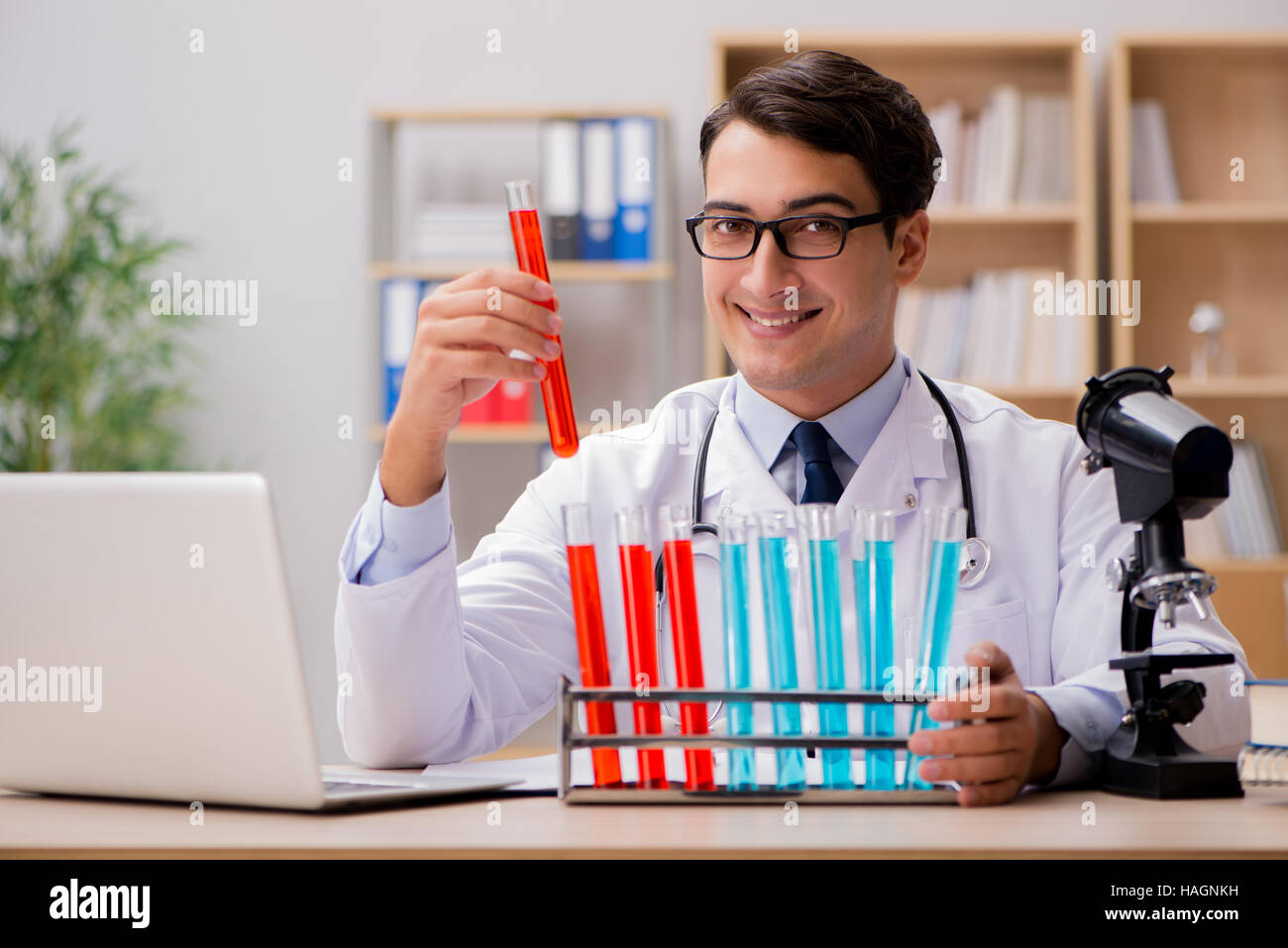 Man doctor working in the lab Stock Photo - Alamy