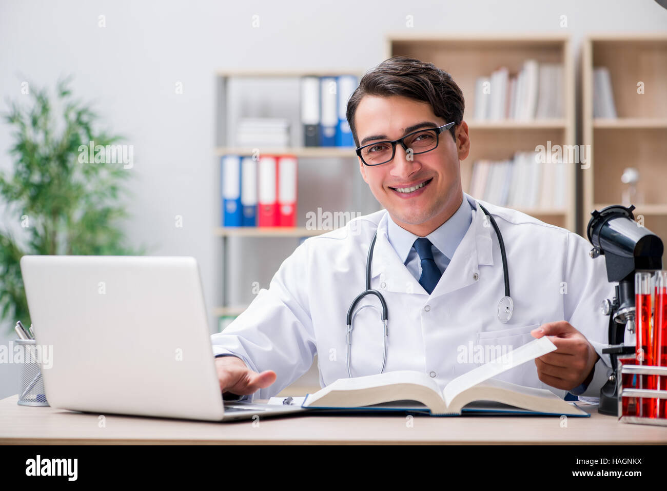 Young doctor studying medical education Stock Photo - Alamy