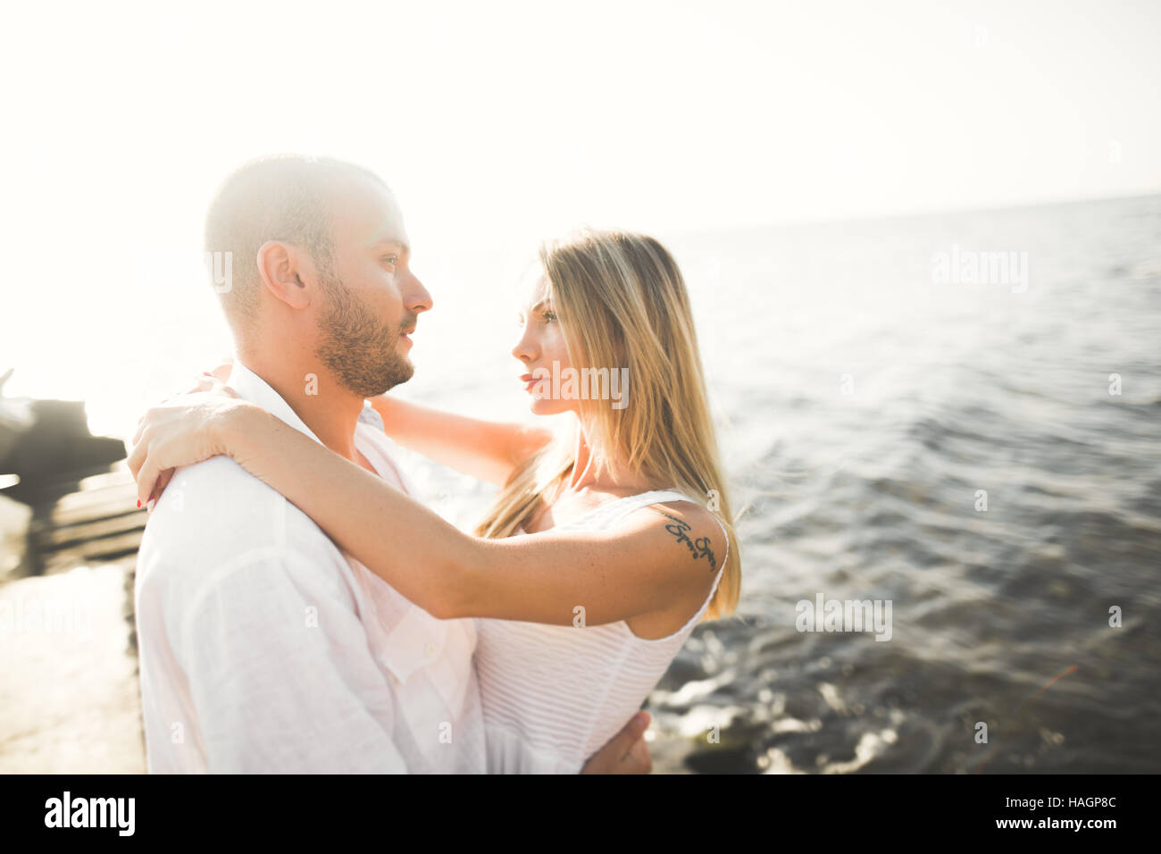 Young Couple Kissing Rocks Stock Photos & Young Couple Kissing Rocks ...