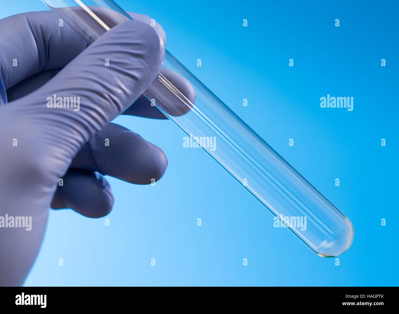 empty test tube in hand Stock Photo - Alamy
