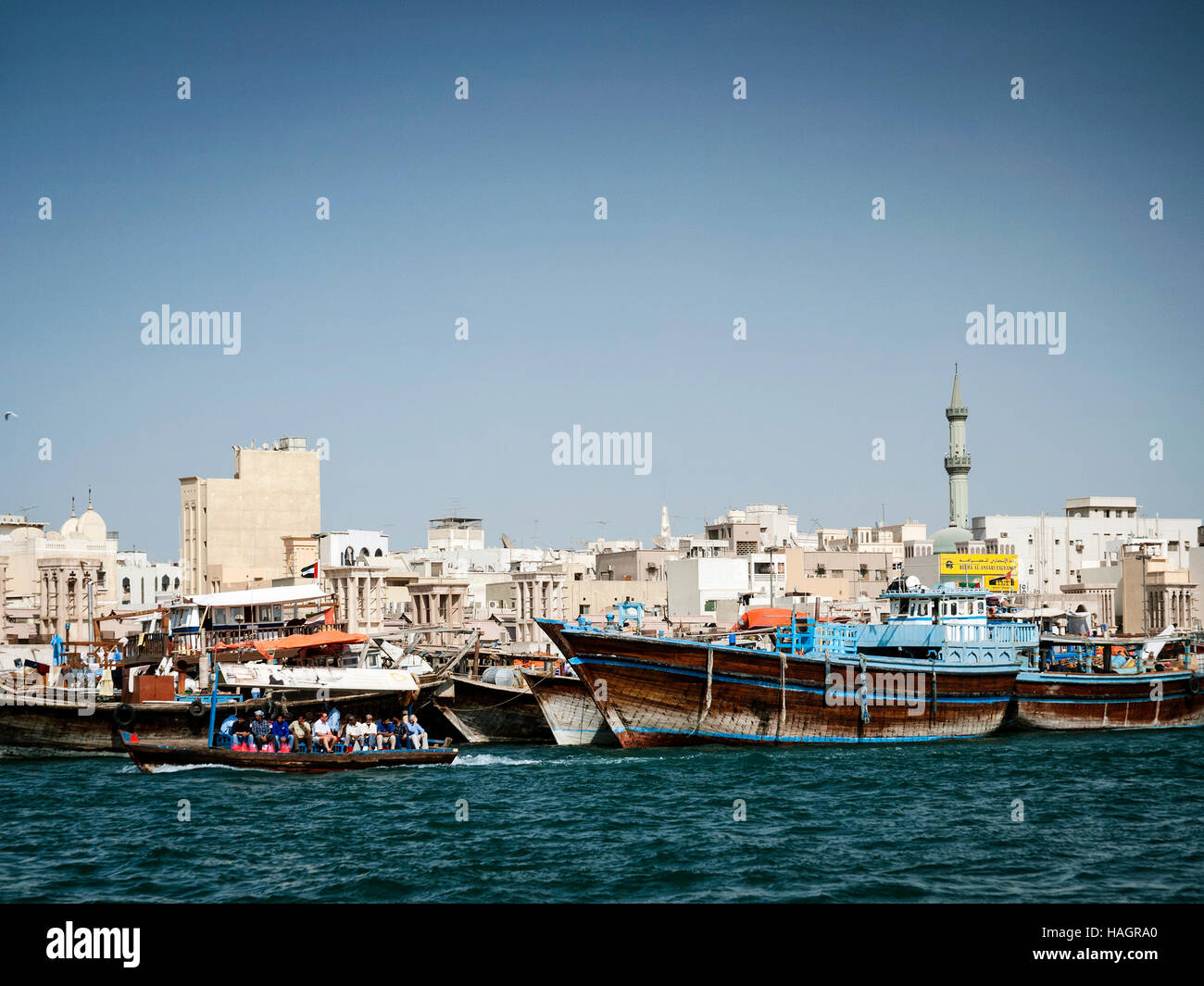 traditional old arabian wood dhow boats in deira harbour of dubai port ...