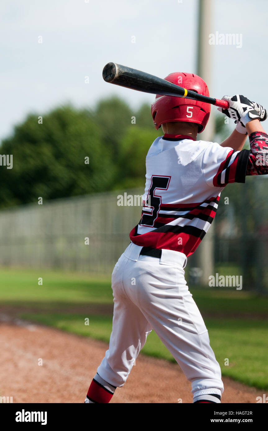 Little league baseball player getting ready to swing the bat Stock ...