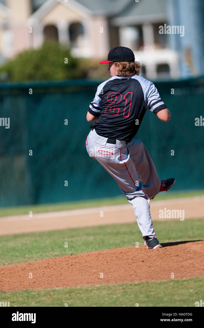 American teenage high school pitcher on the mound during a game Stock ...