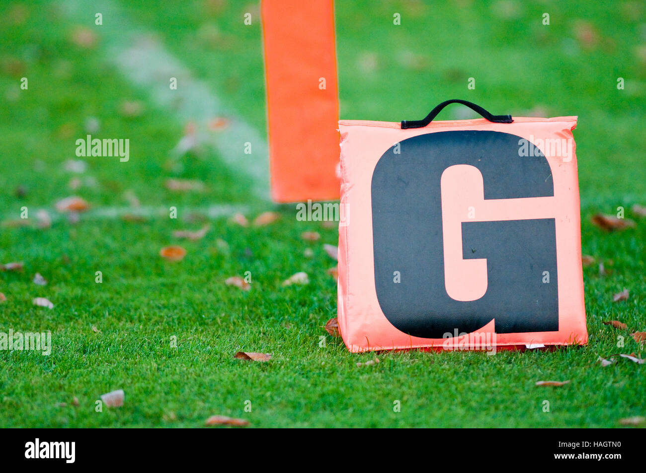 Orange football touchdown pilon Stock Photo - Alamy