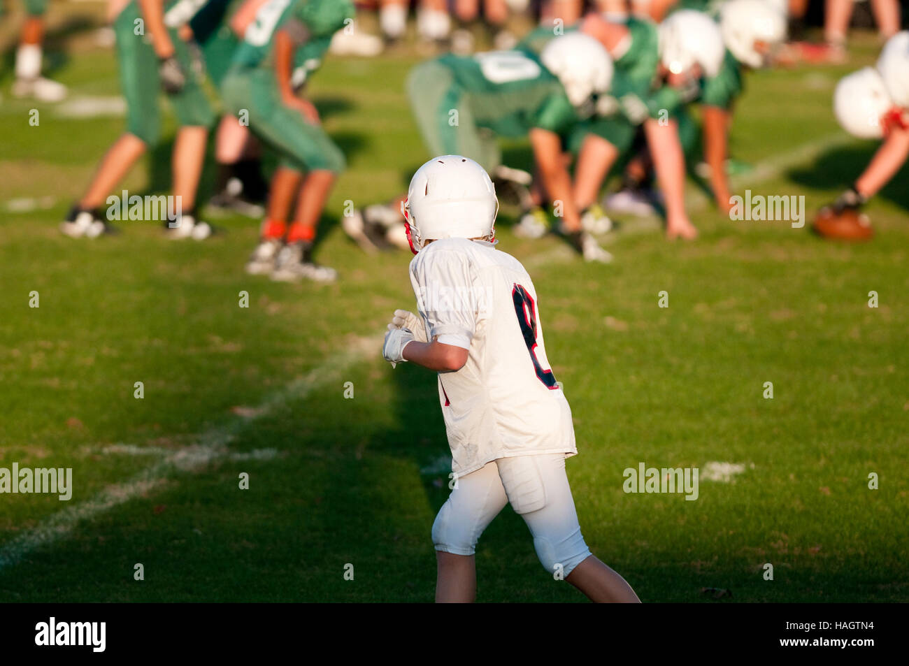 Wide Reciever waiting to go out for a pass Stock Photo - Alamy