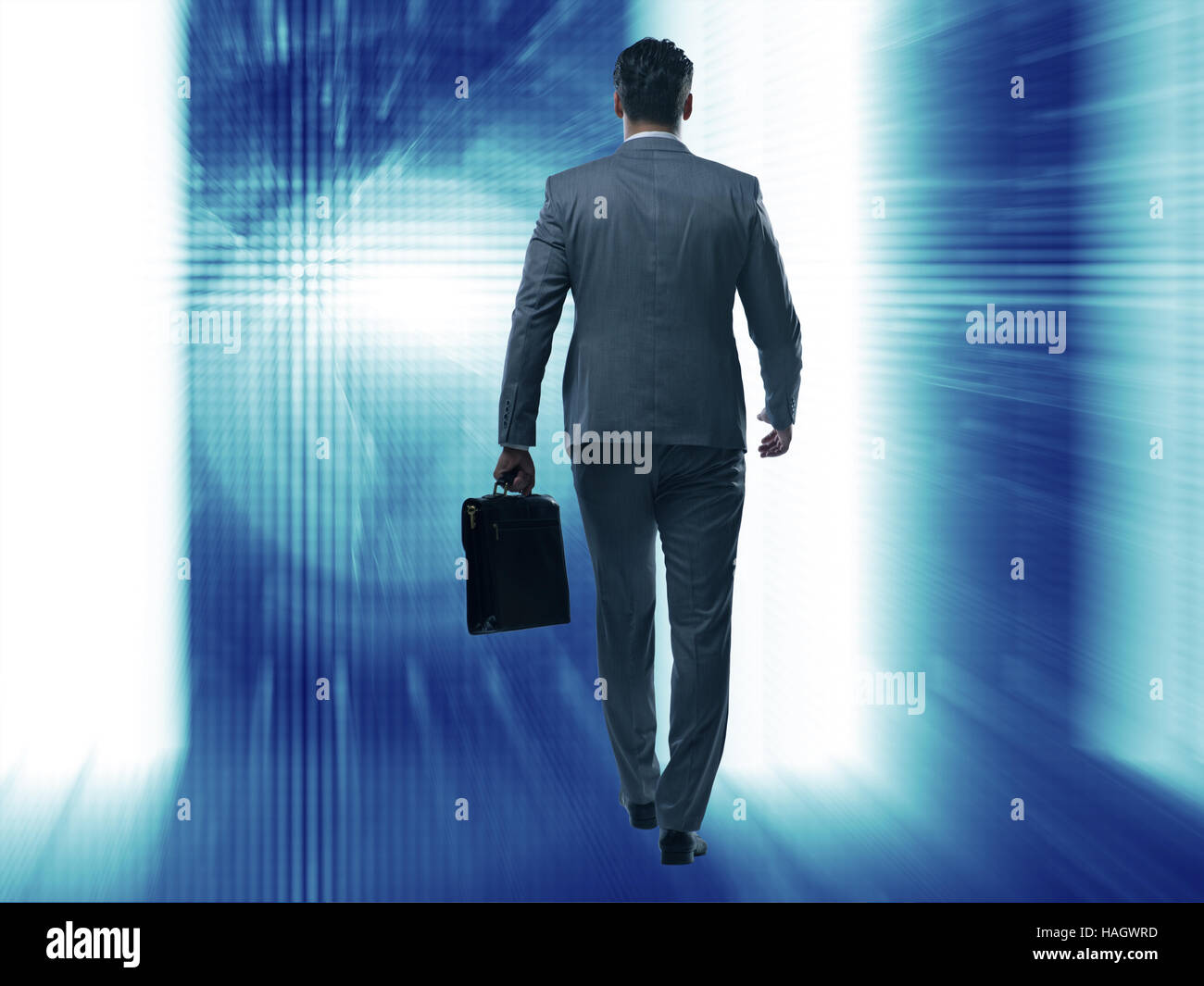 Businessman walking away from the camera Stock Photo - Alamy