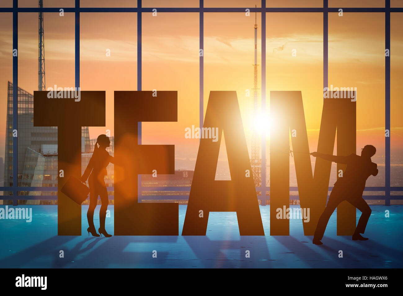 Teamwork concept with the word team Stock Photo - Alamy
