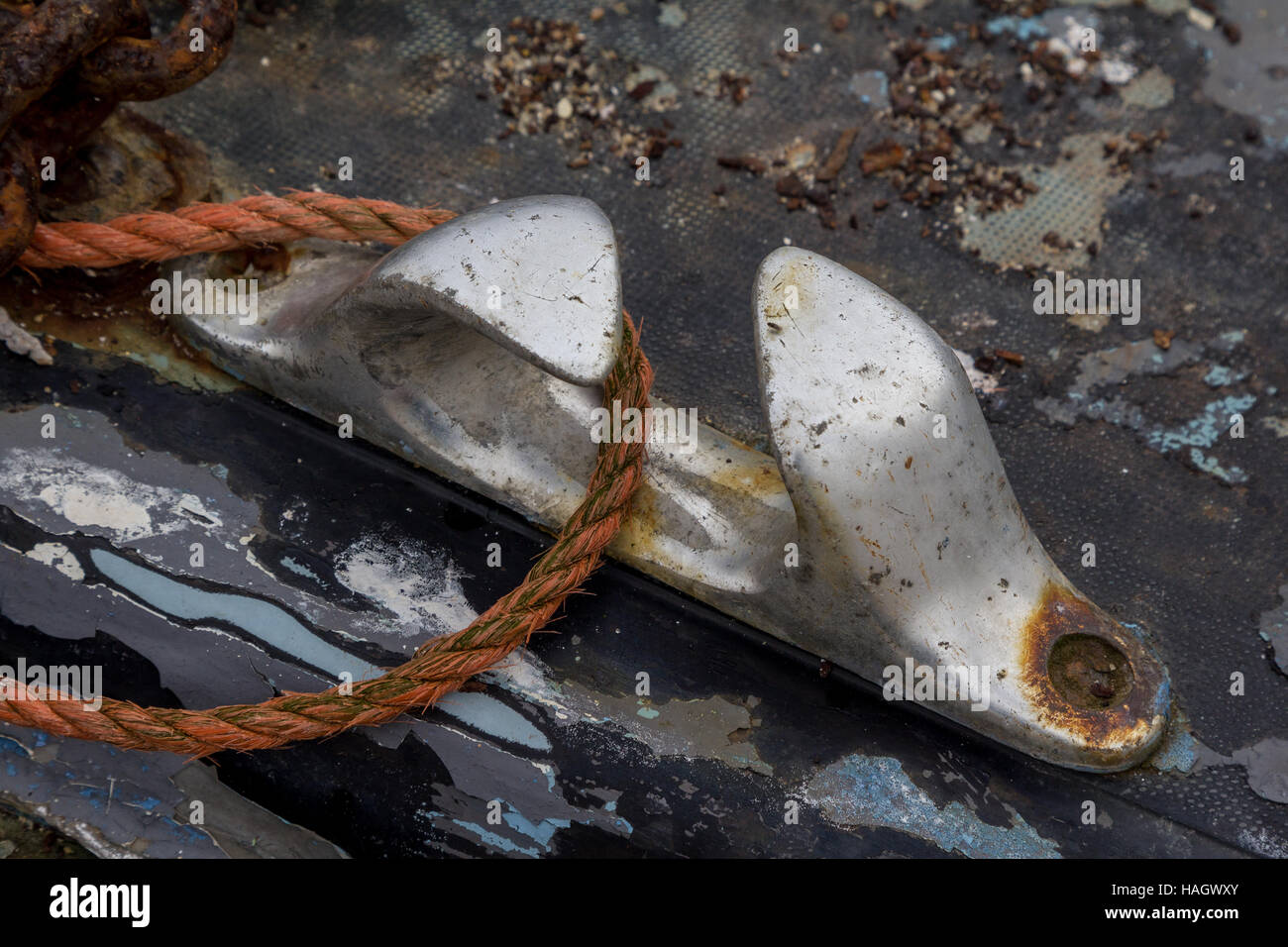 Cleat with rusty screws on an old boat Stock Photo - Alamy