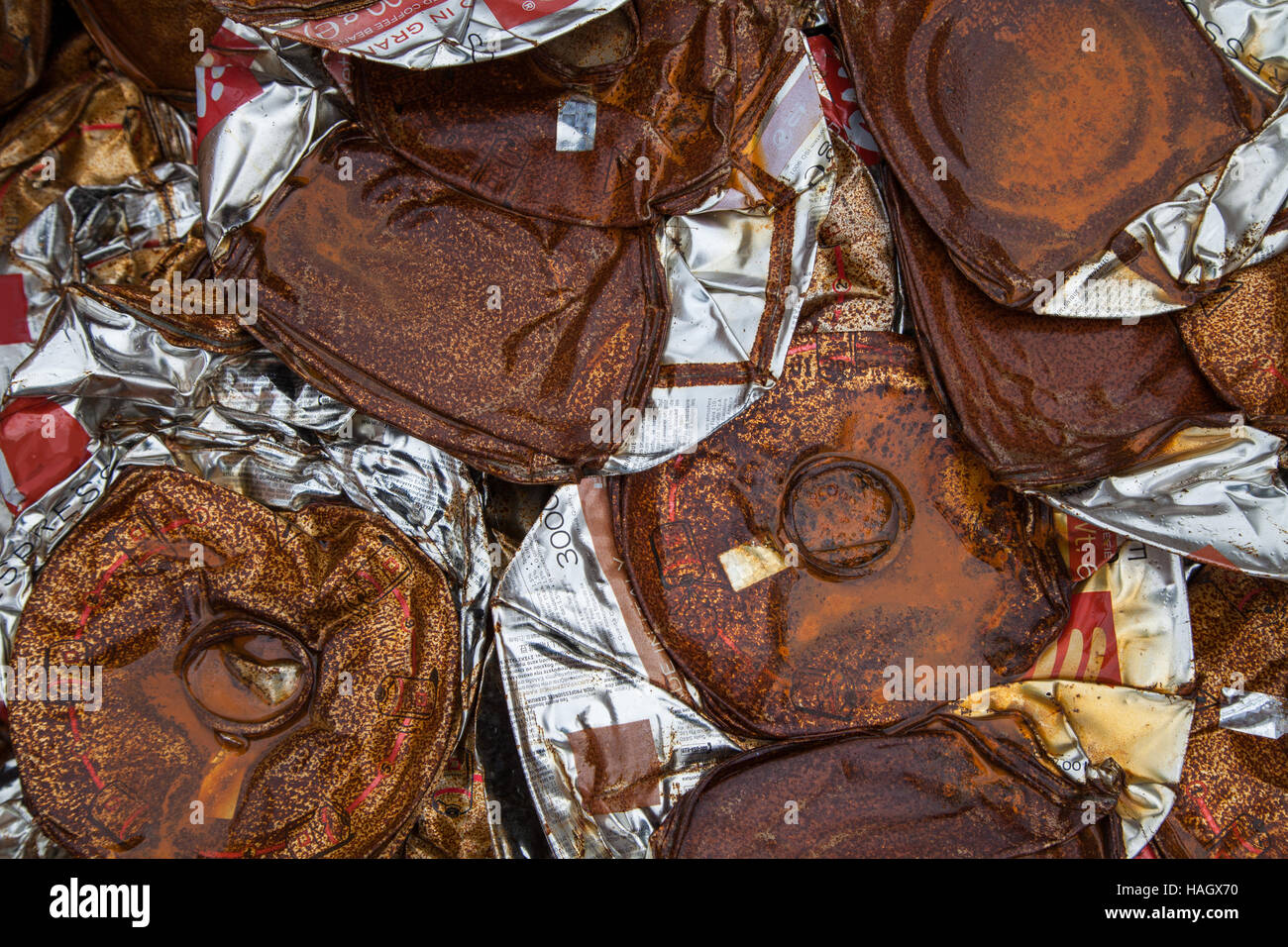 Crushed tin cans in a rusty state Stock Photo - Alamy