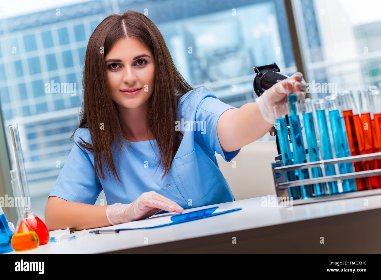 Young woman working in the laboratory Stock Photo - Alamy