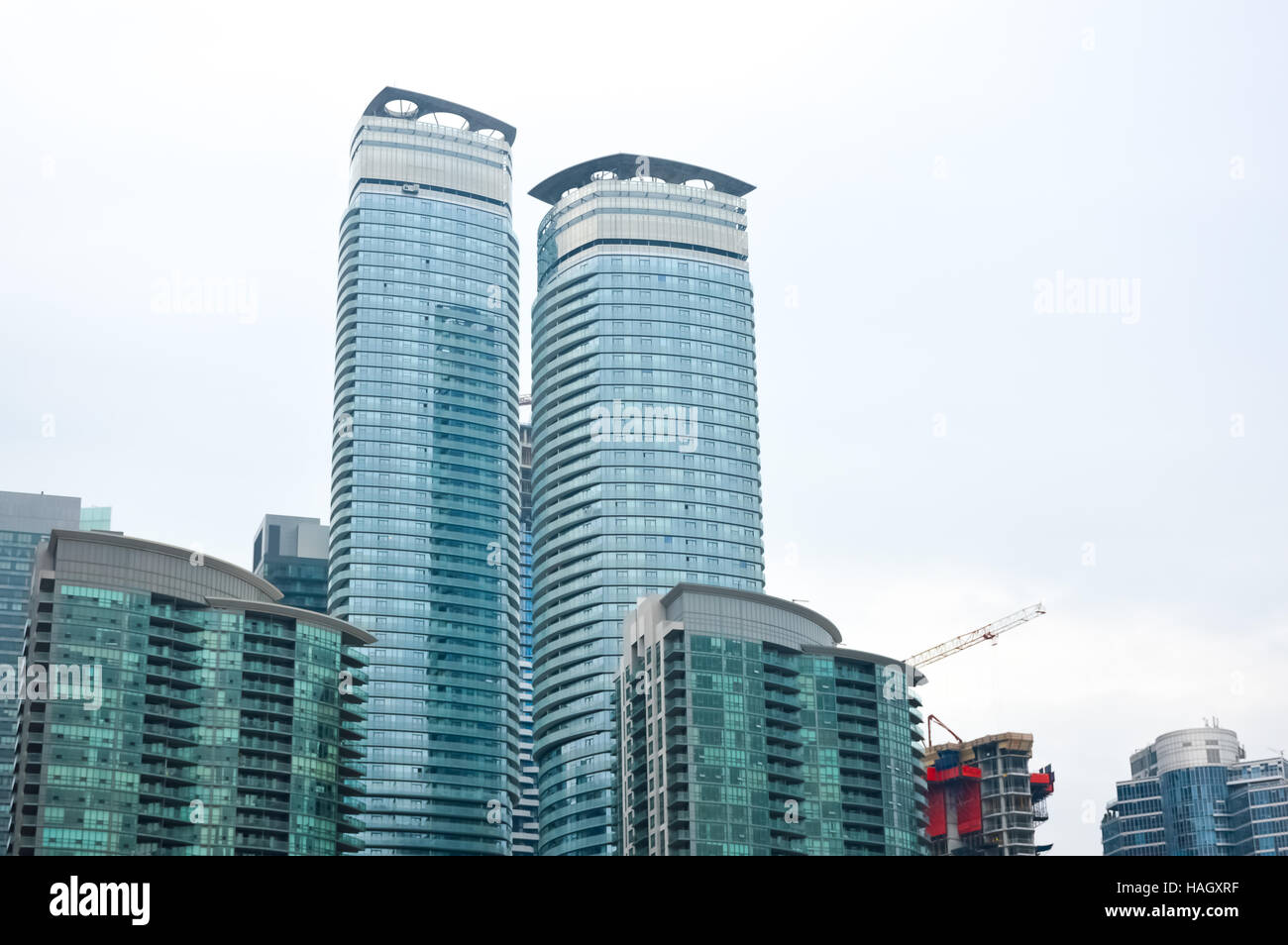 Facade of blue glass skyscraper in Toronto downtown at low angle Stock ...