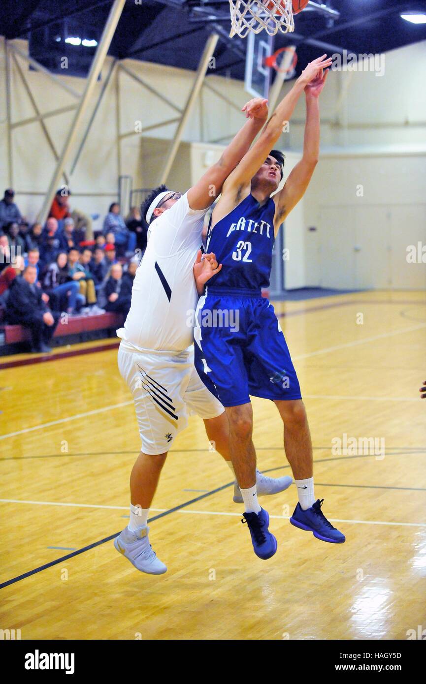 High school players battling or a rebound that deflected well above the ...