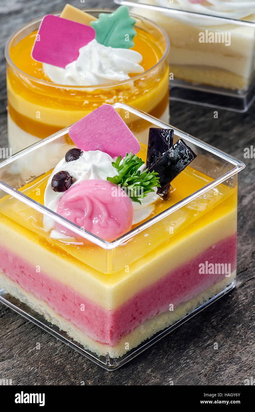 cup of lovely mousse cake on wooden background Stock Photo - Alamy