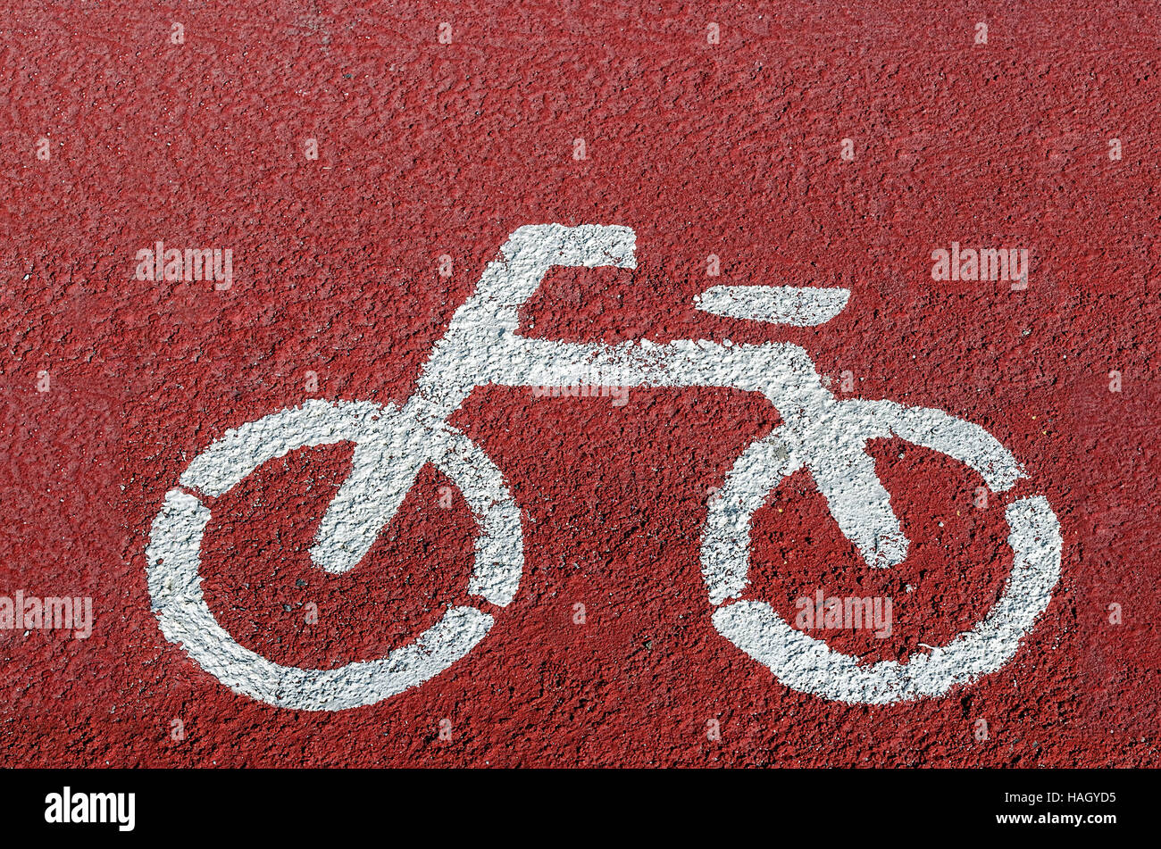 White painted sign for bikes on road Stock Photo - Alamy