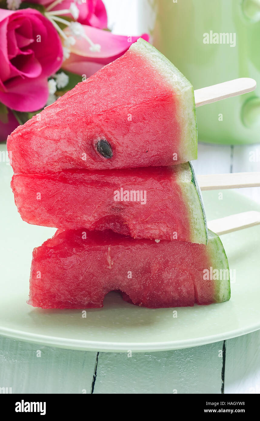 Stack of watermelon with ice cream sticks in close up view Stock Photo ...