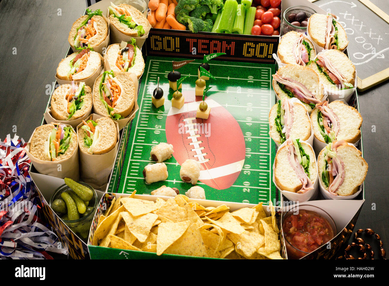 Football Snack Stadium filled with sub sandwiches, veggies and chips ...