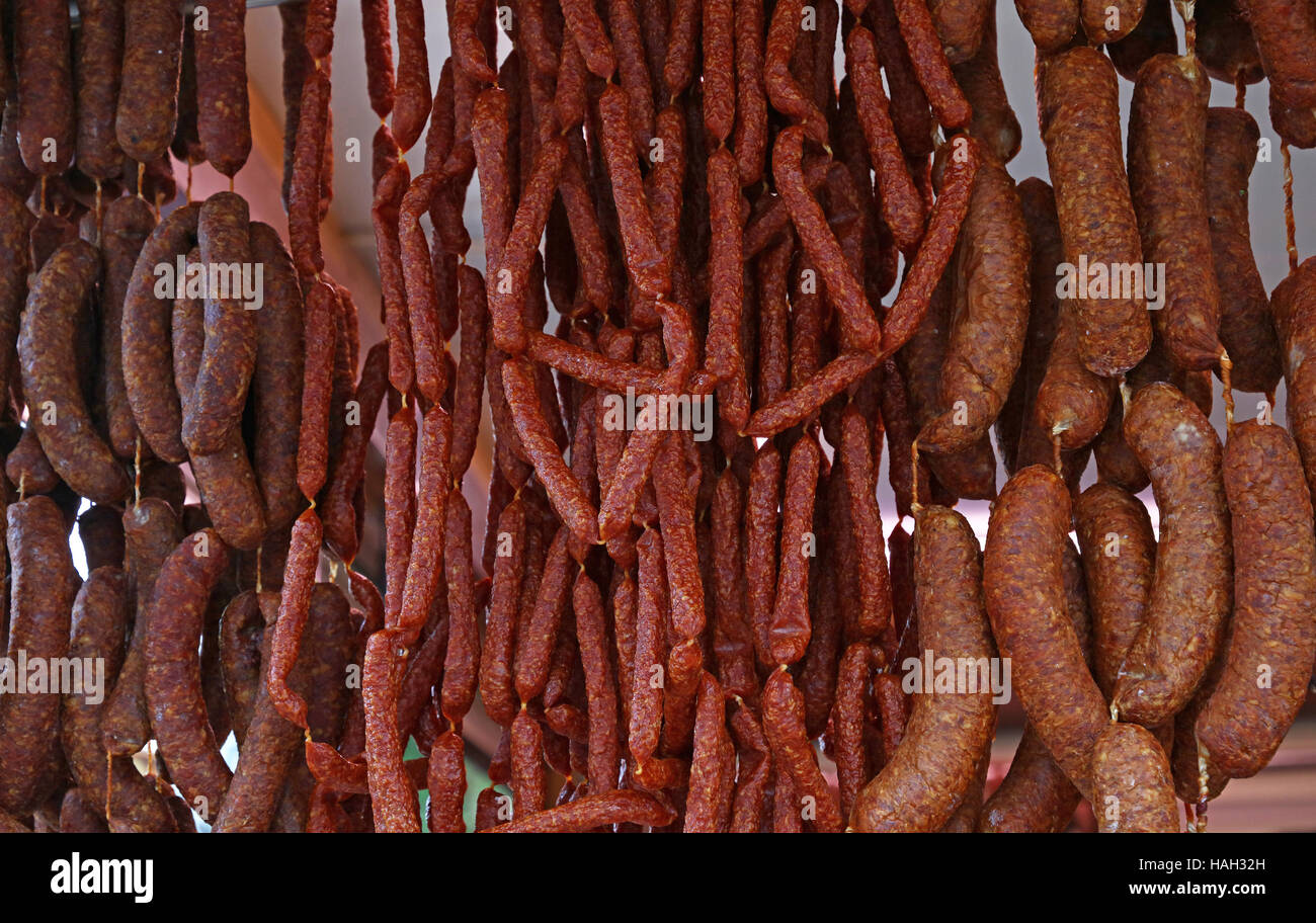 Cured smoked dried assorted homemade artisan red pork meat sausages ...