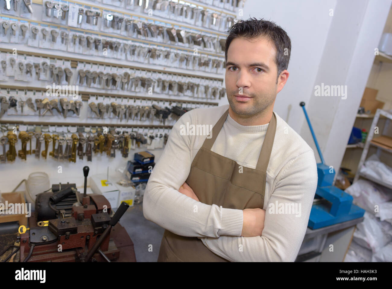 Locksmith cutting key machine hi-res stock photography and images - Alamy