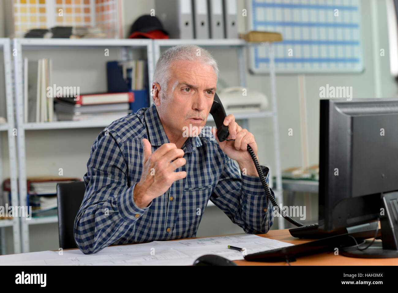 Annoying customer on the phone Stock Photo - Alamy